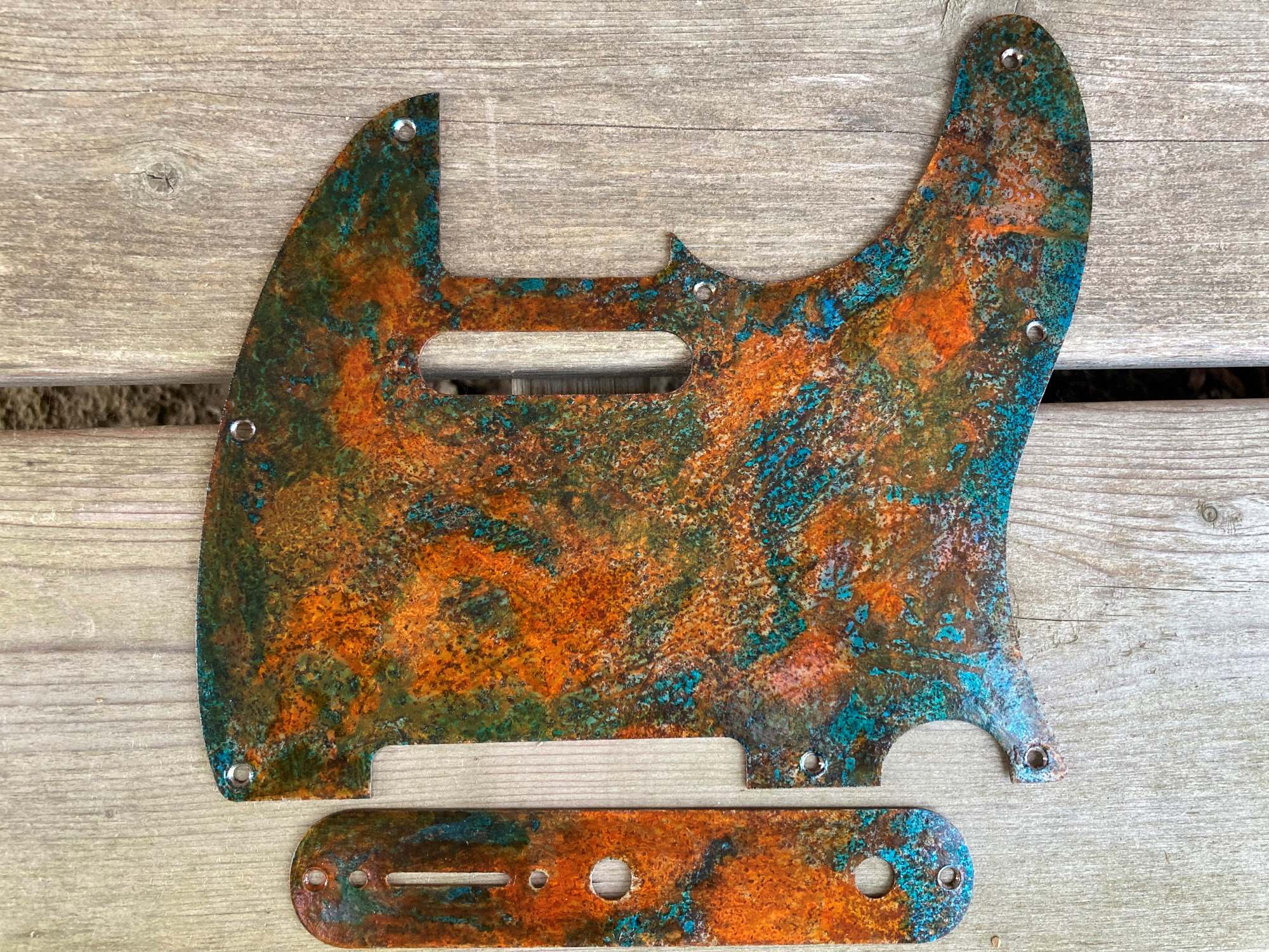 One of a kind rusted metal pickguards. Home of rusted metal guitar parts